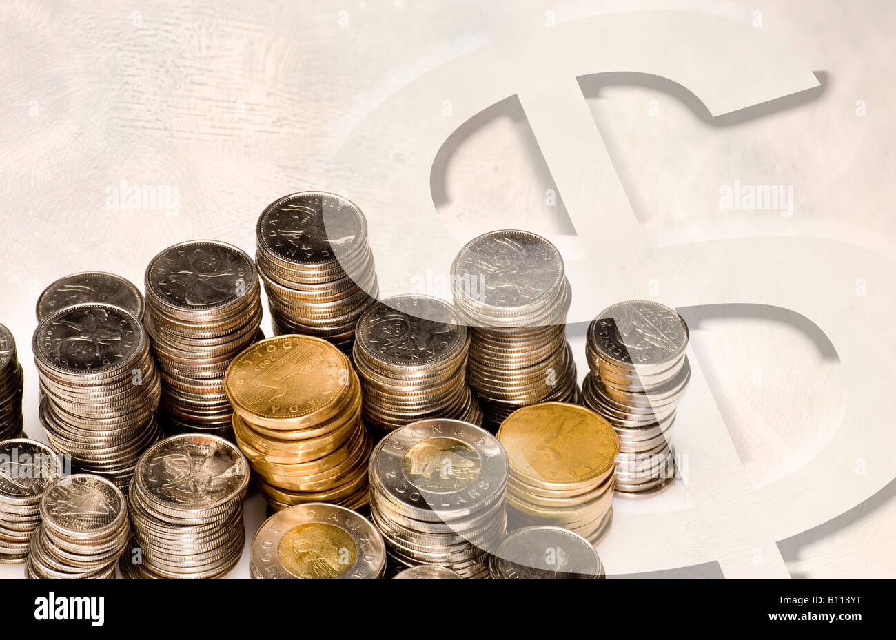 Money sign on top of coins Stock Photo - Alamy