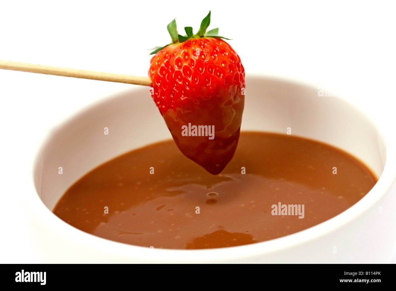 Kitchen preparation white chocolate dipped strawberries Cut Out Stock ...