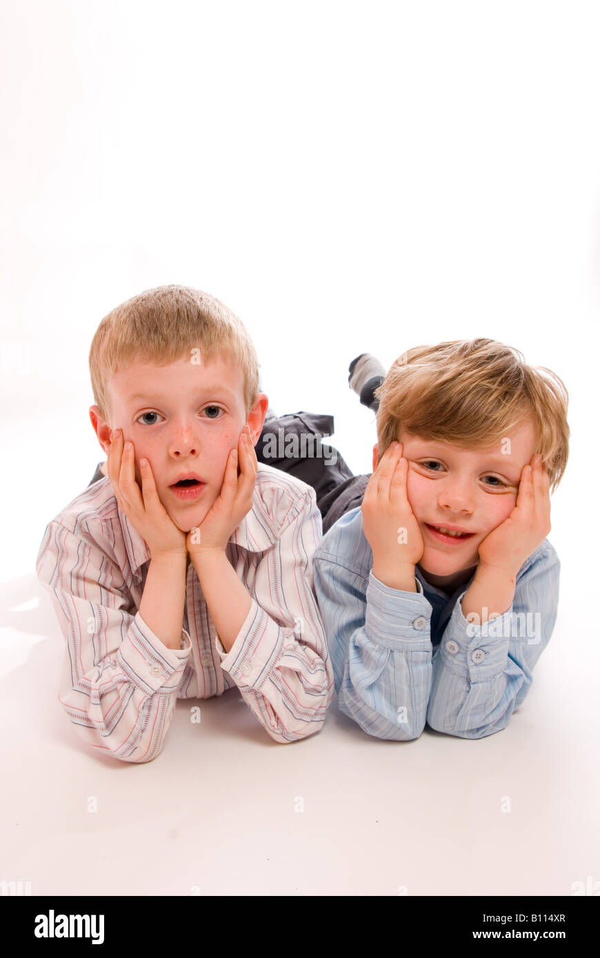 Two cheeky boys Stock Photo - Alamy