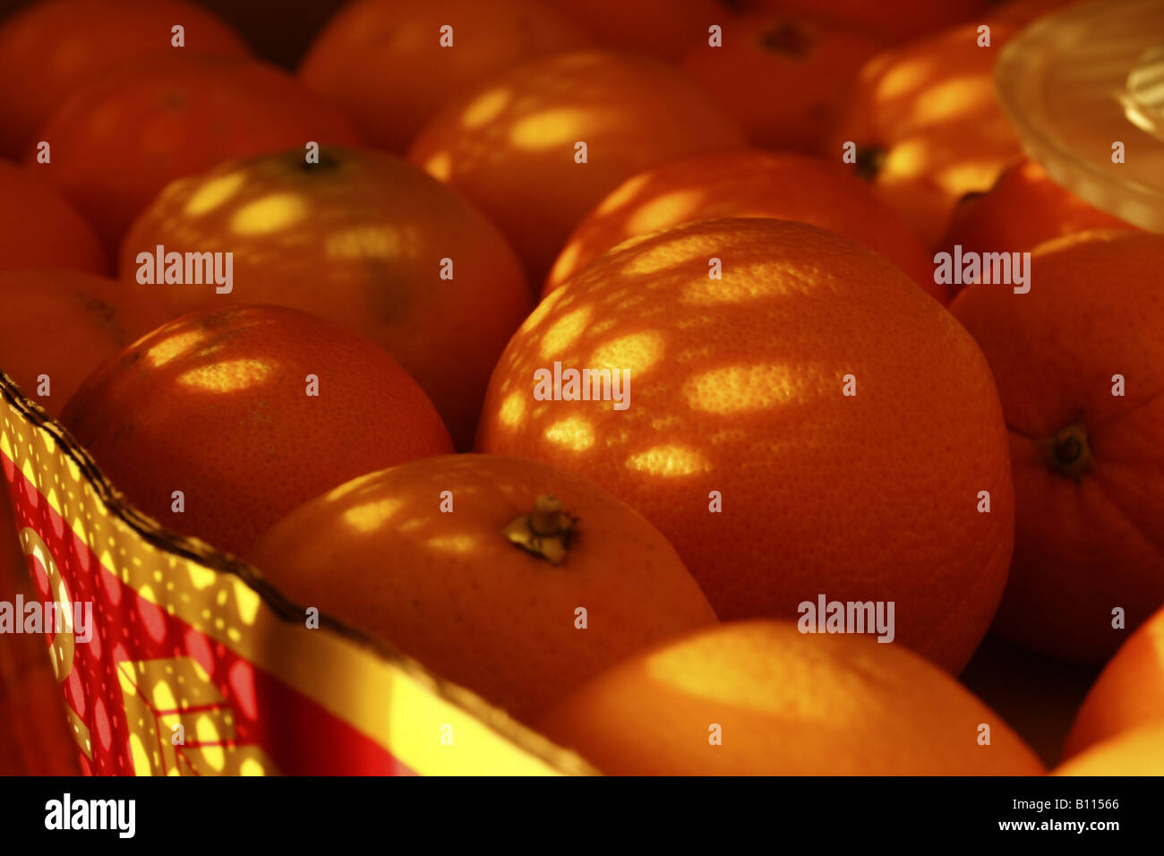 Boxed Oranges with dim lighting Stock Photo - Alamy