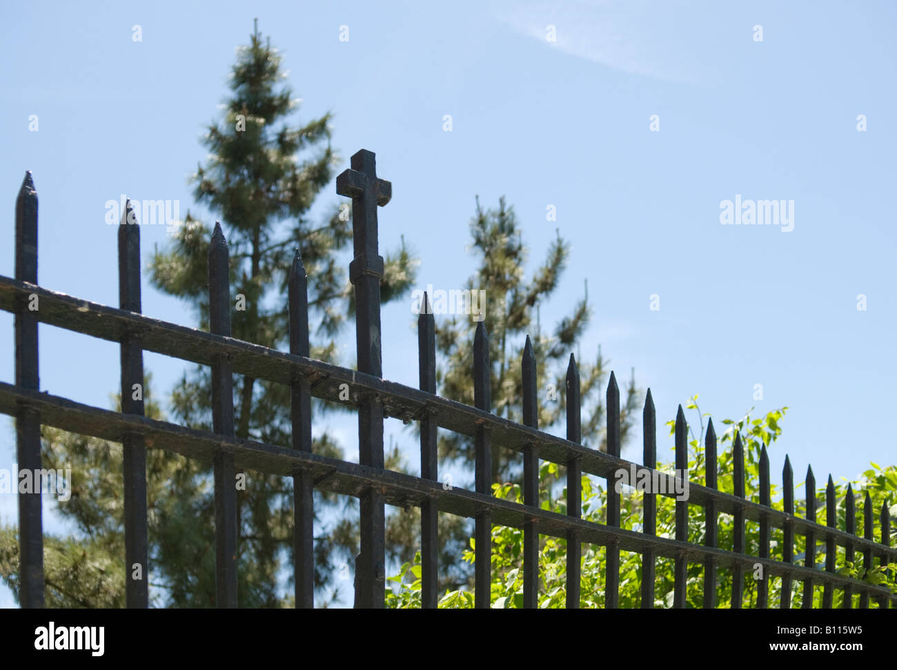 Christian cross on fence Stock Photo - Alamy