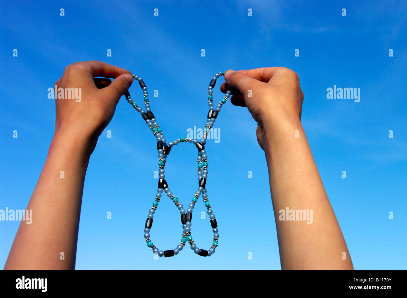 Necklace loop hi-res stock photography and images - Alamy