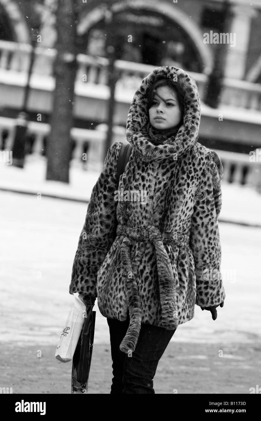 A young fashionable Muscovite woman in the Alexander Gardens Moscow ...