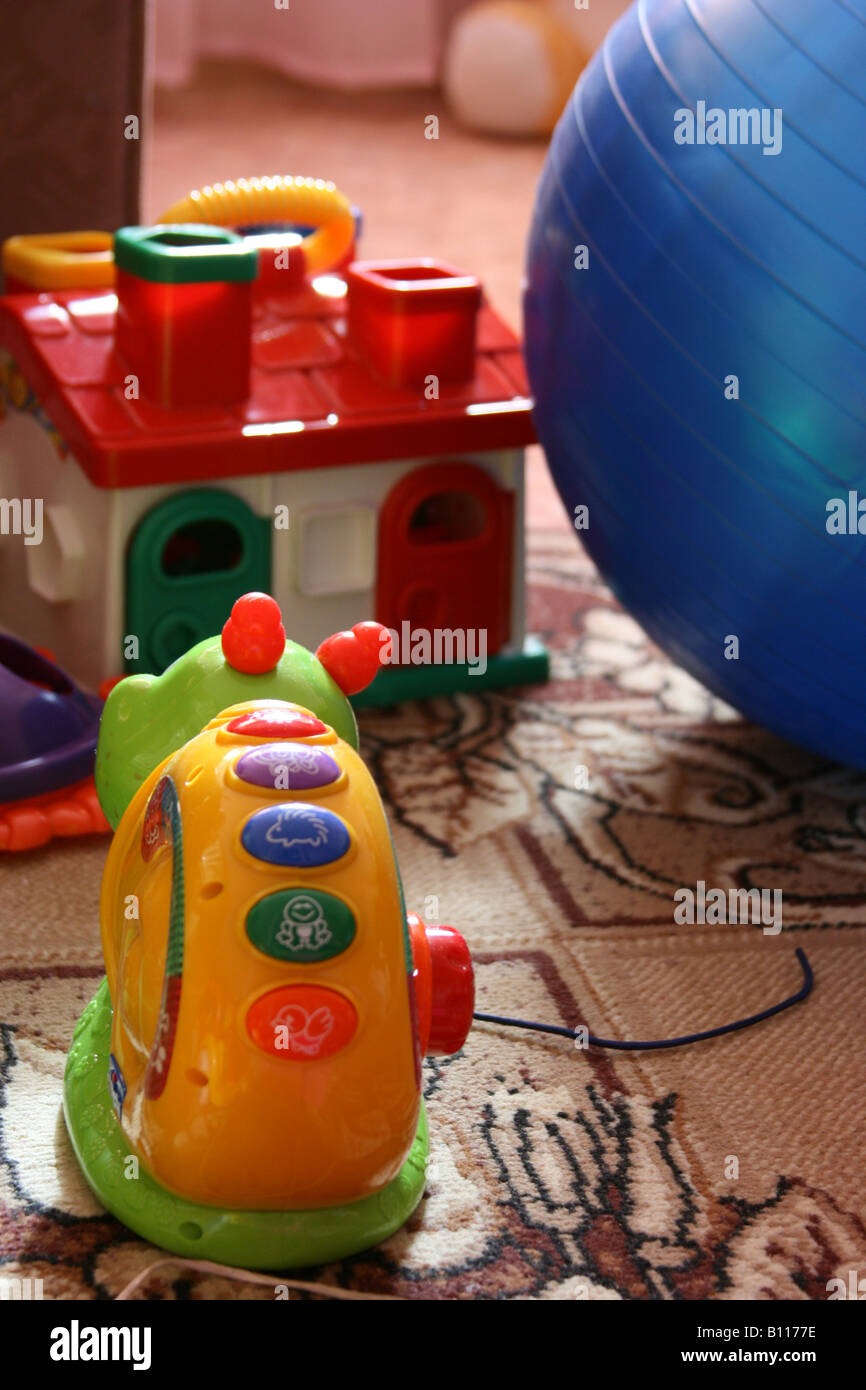 toys on carpet Stock Photo - Alamy