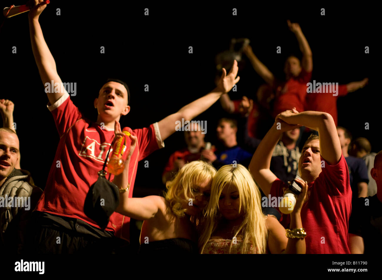 Delirious Manchester United fans celebrate in Manchester city centre ...