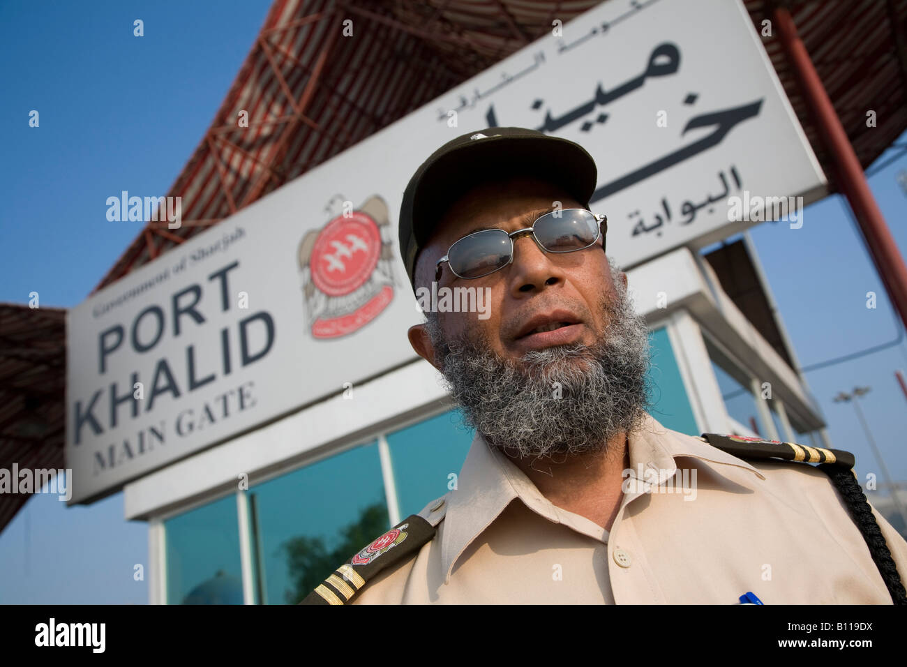 Security officer infront of Port Khalid Signage at front entrance to ...