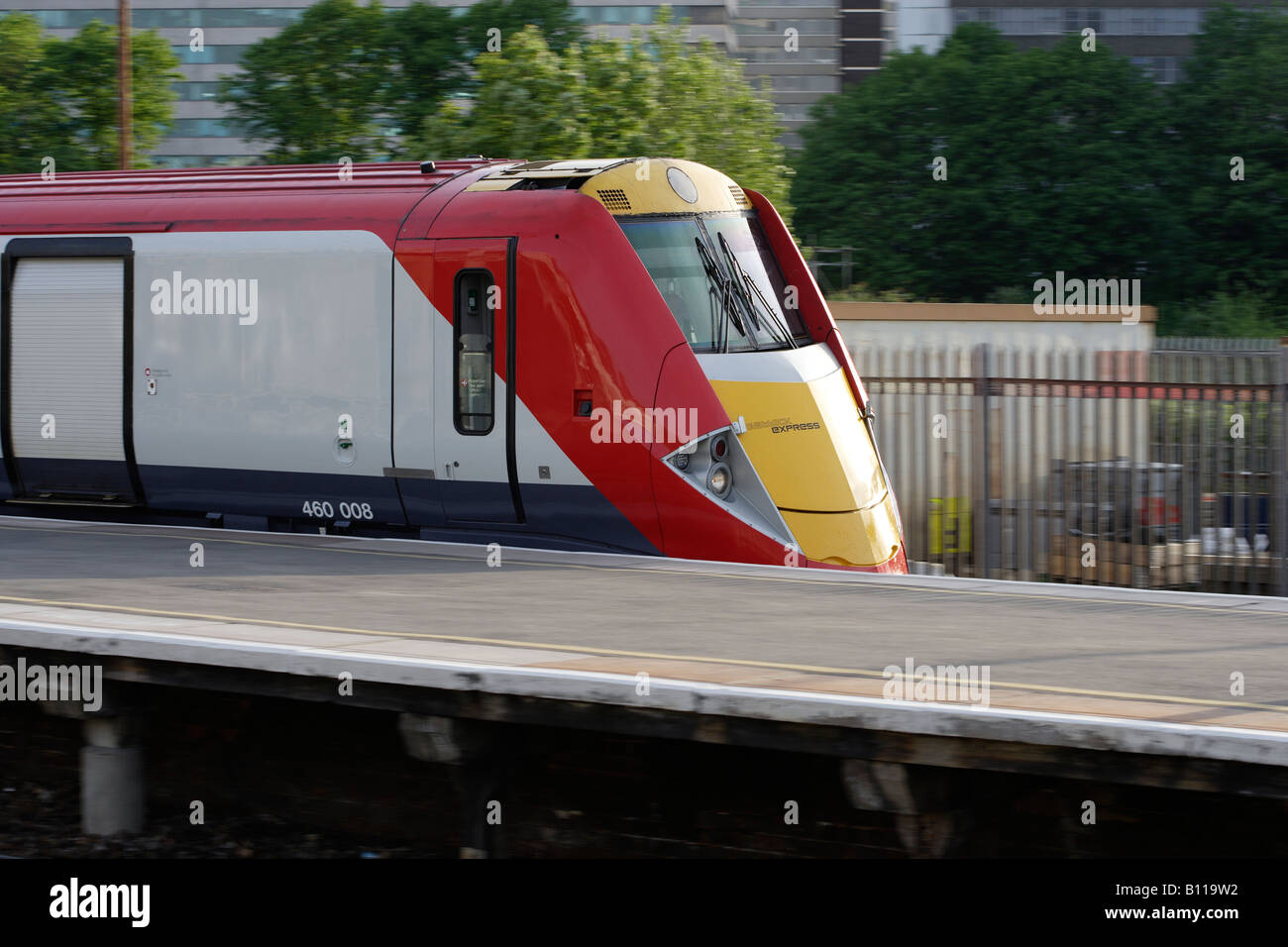 Gatwick Express train approaching station England UK Stock Photo - Alamy