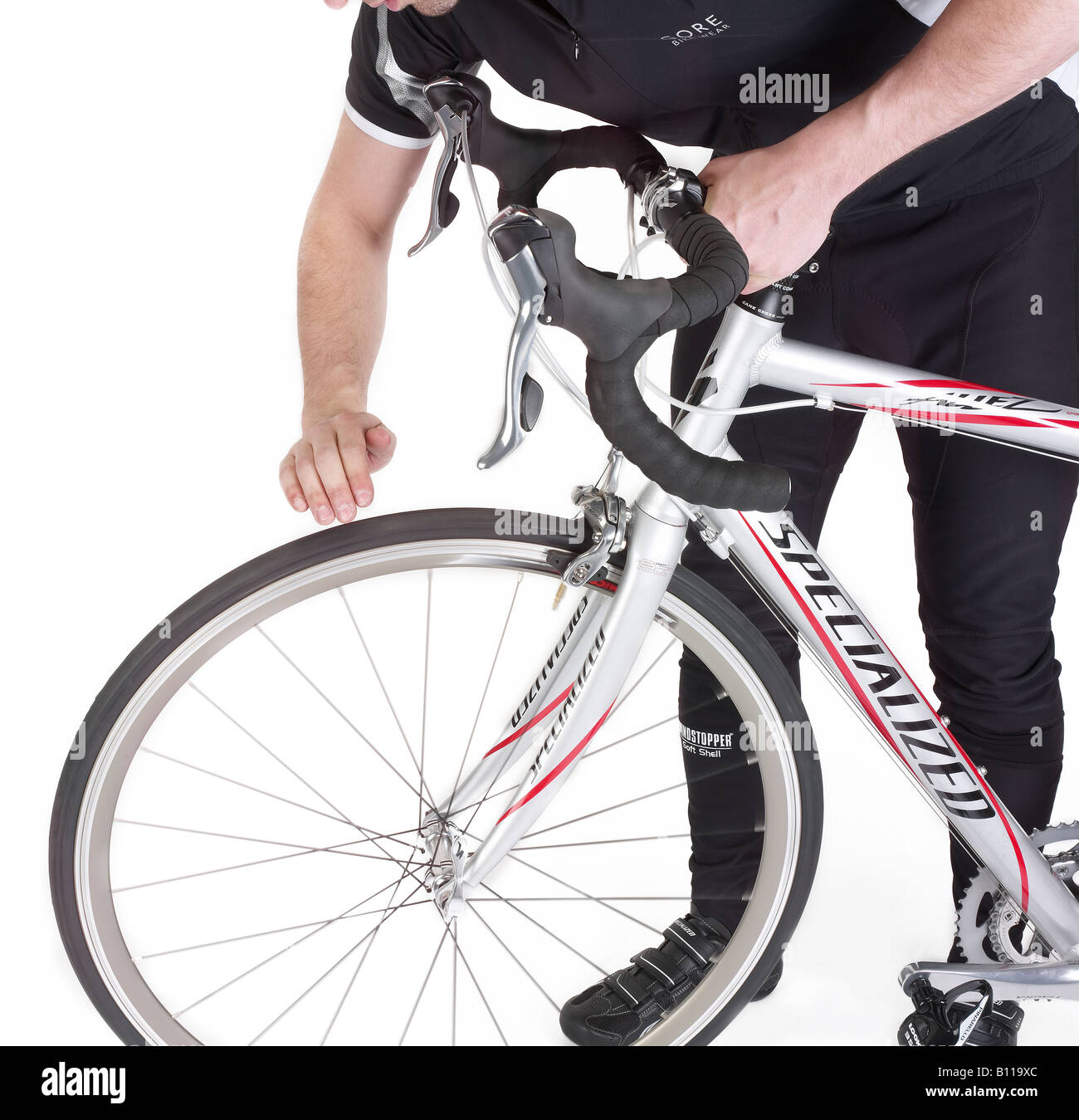 Hand spinning bicycle front wheel Stock Photo - Alamy