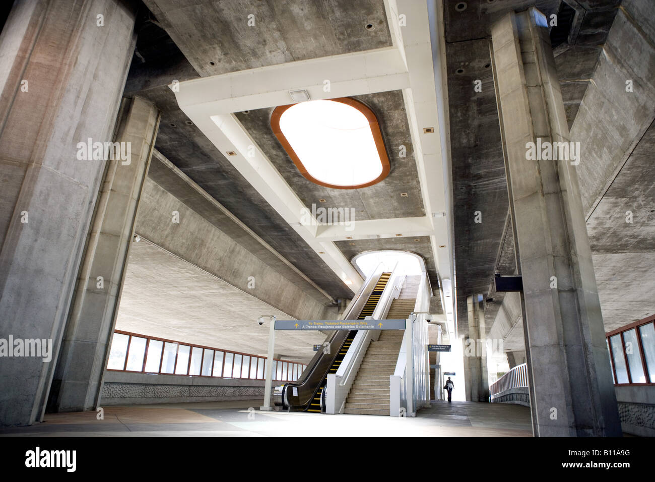 Walkway in lower level of train station Stock Photo - Alamy