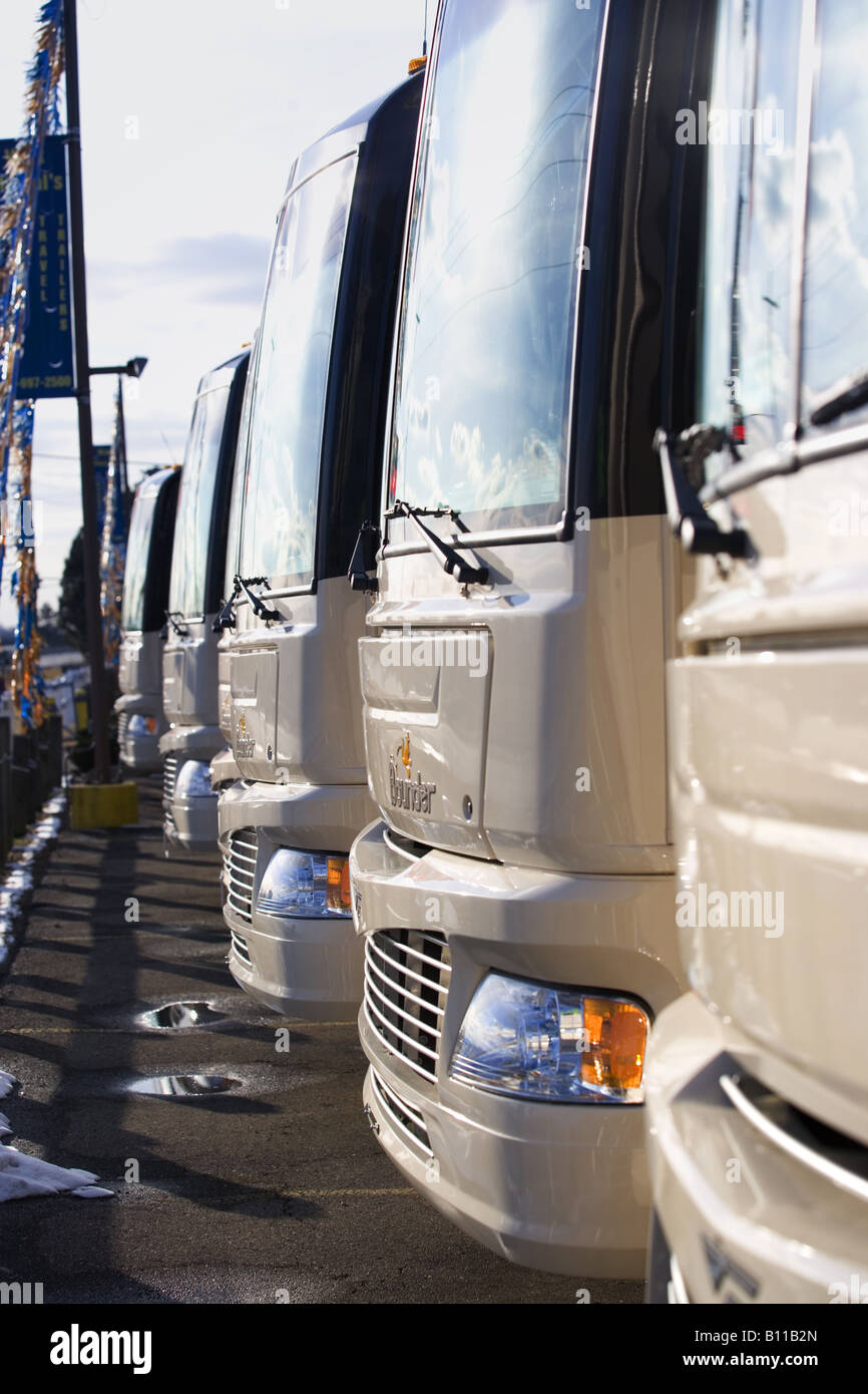 Close up of five parked buses Stock Photo - Alamy