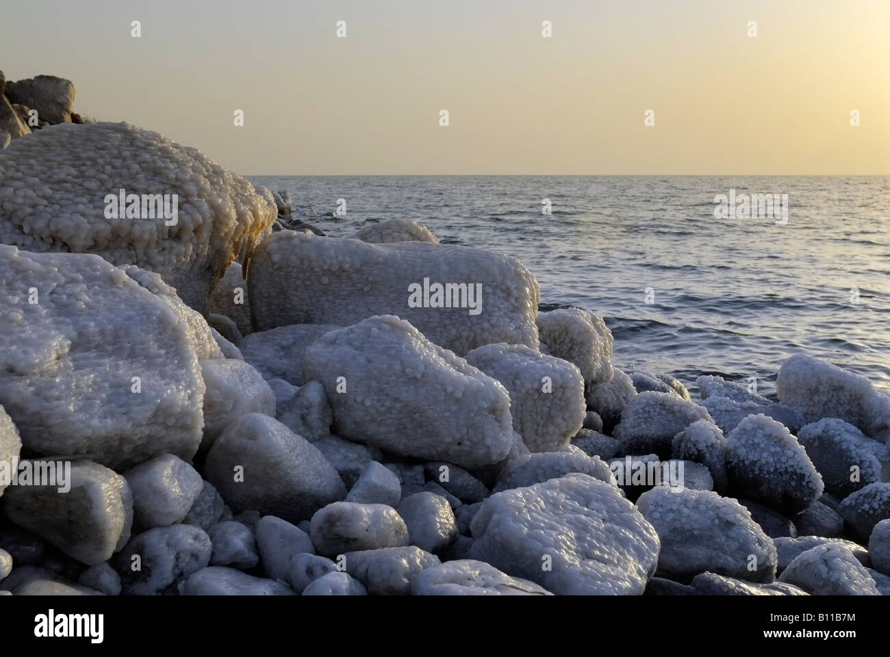 rocks with salt at coastline of Dead Sea Jordan Arabia, lowest place on ...