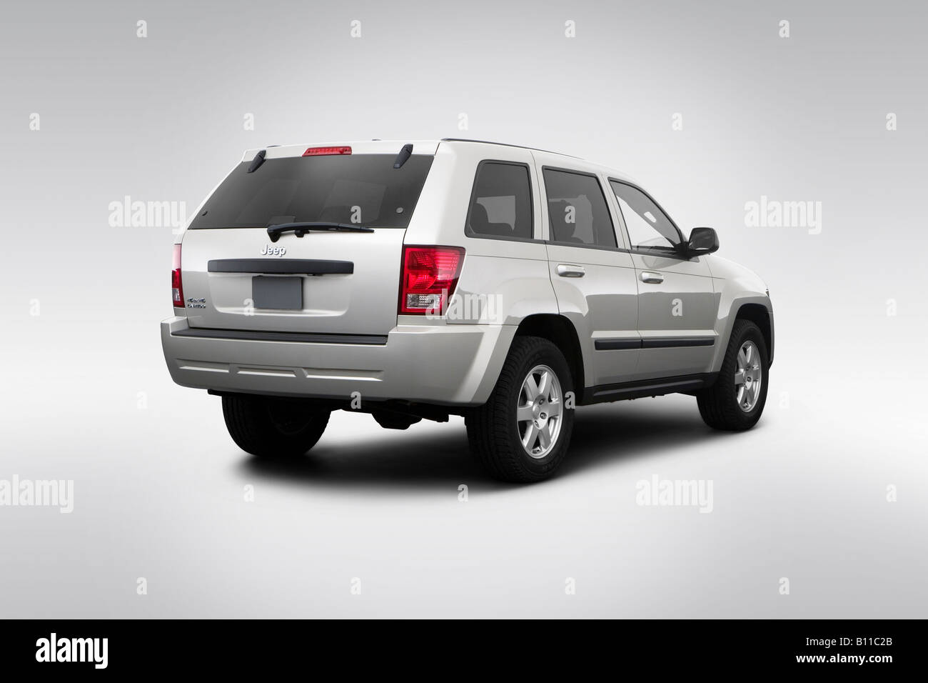 2008 Jeep Grand Cherokee Laredo in Gray - Rear angle view Stock Photo ...