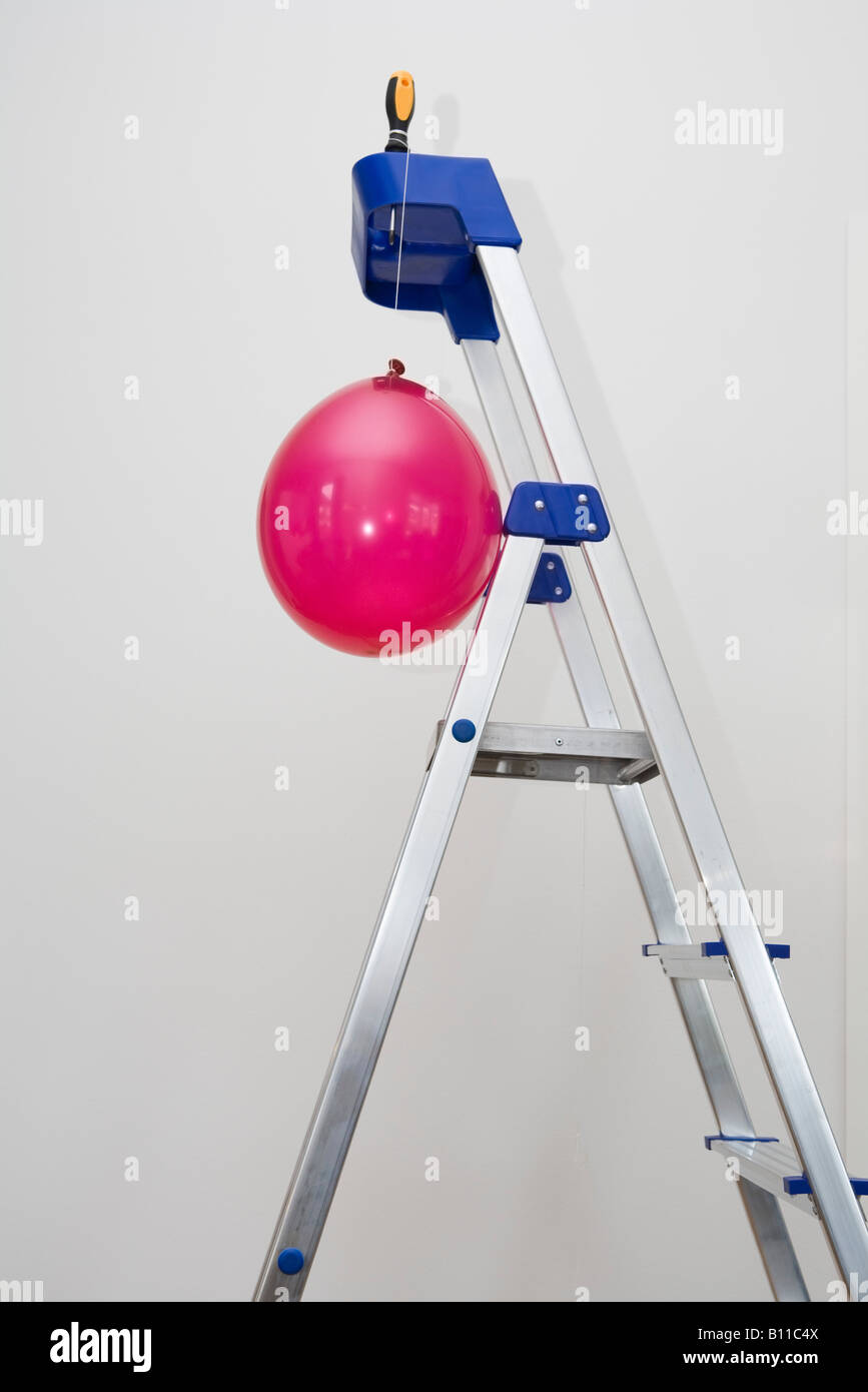 Red balloon and construction ladder Stock Photo - Alamy