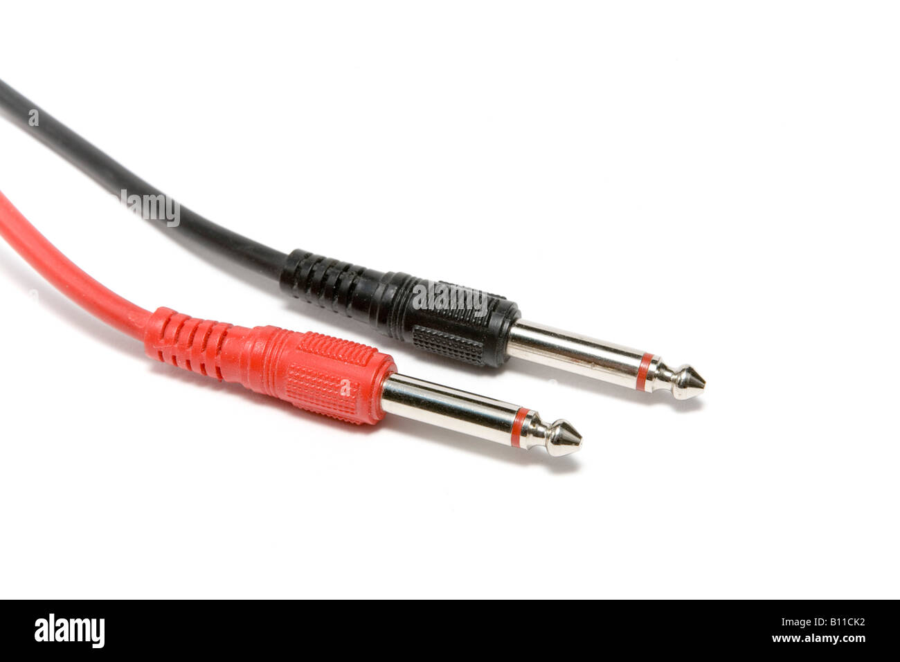 Audio cables on a white background Stock Photo - Alamy