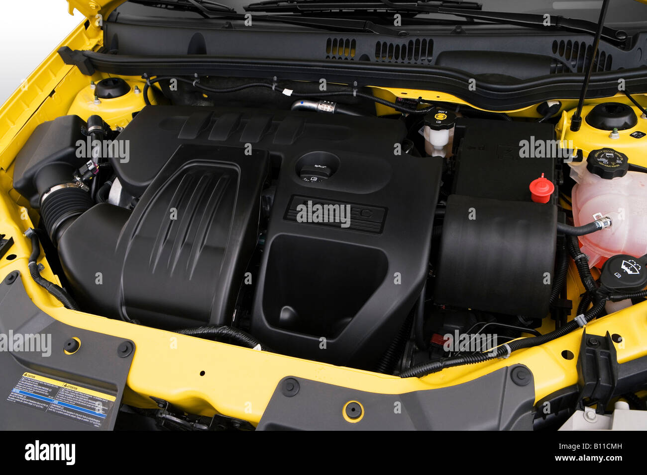 2008 Chevrolet Cobalt LT in Yellow - Engine Stock Photo - Alamy