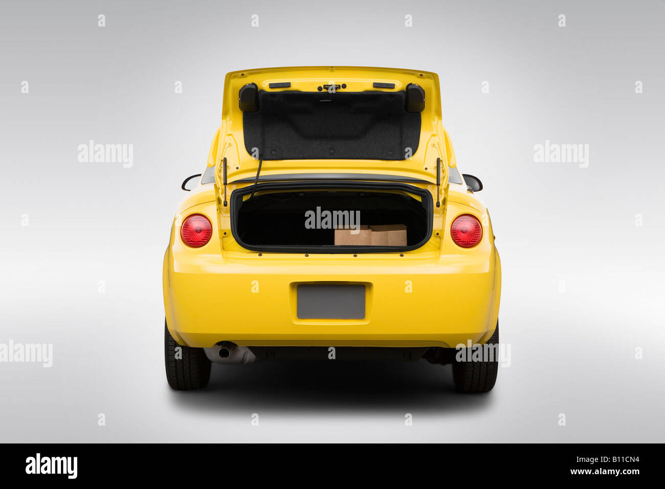2008 Chevrolet Cobalt LT in Yellow - Trunk Props Stock Photo - Alamy