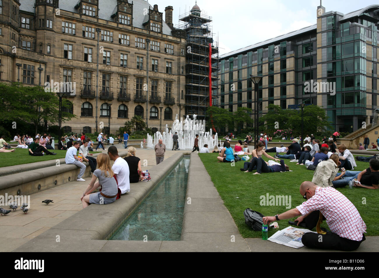 people relaxing in the summer sun in the winter gardens in sheffield ...