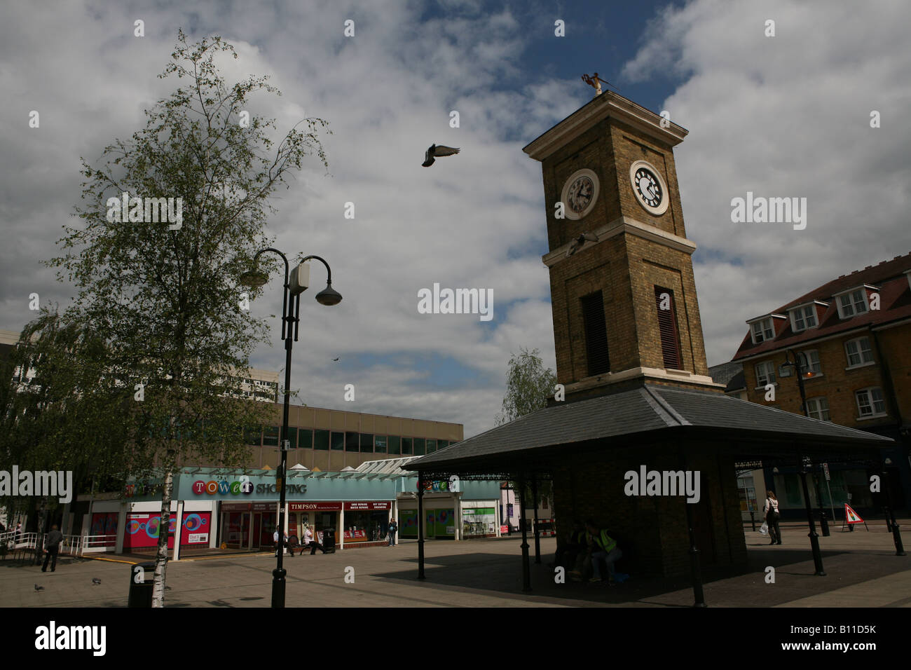 a landscape picture of hoddesdon high street and clock tower with ...