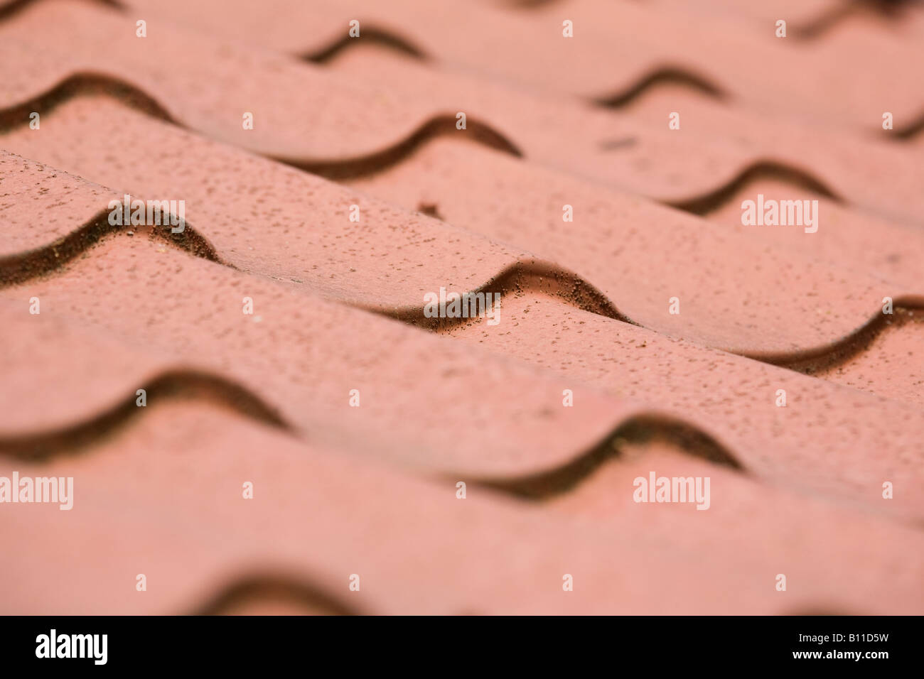 Red ridge roof tiles Stock Photo - Alamy