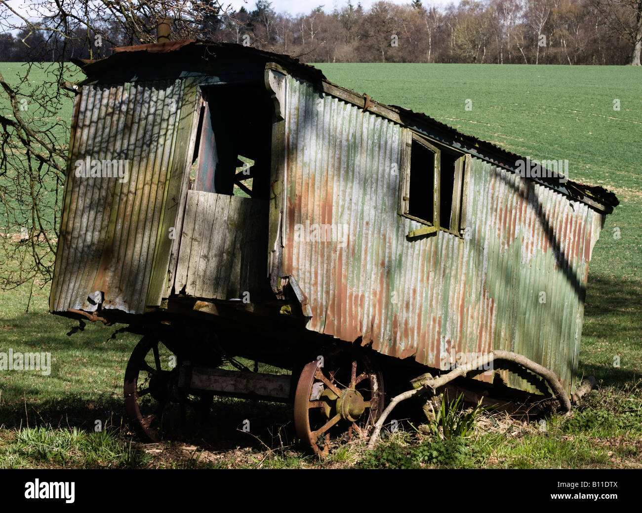 Old Abandoned Corrugated Caravan Type Trailer in a Field Stock Photo ...