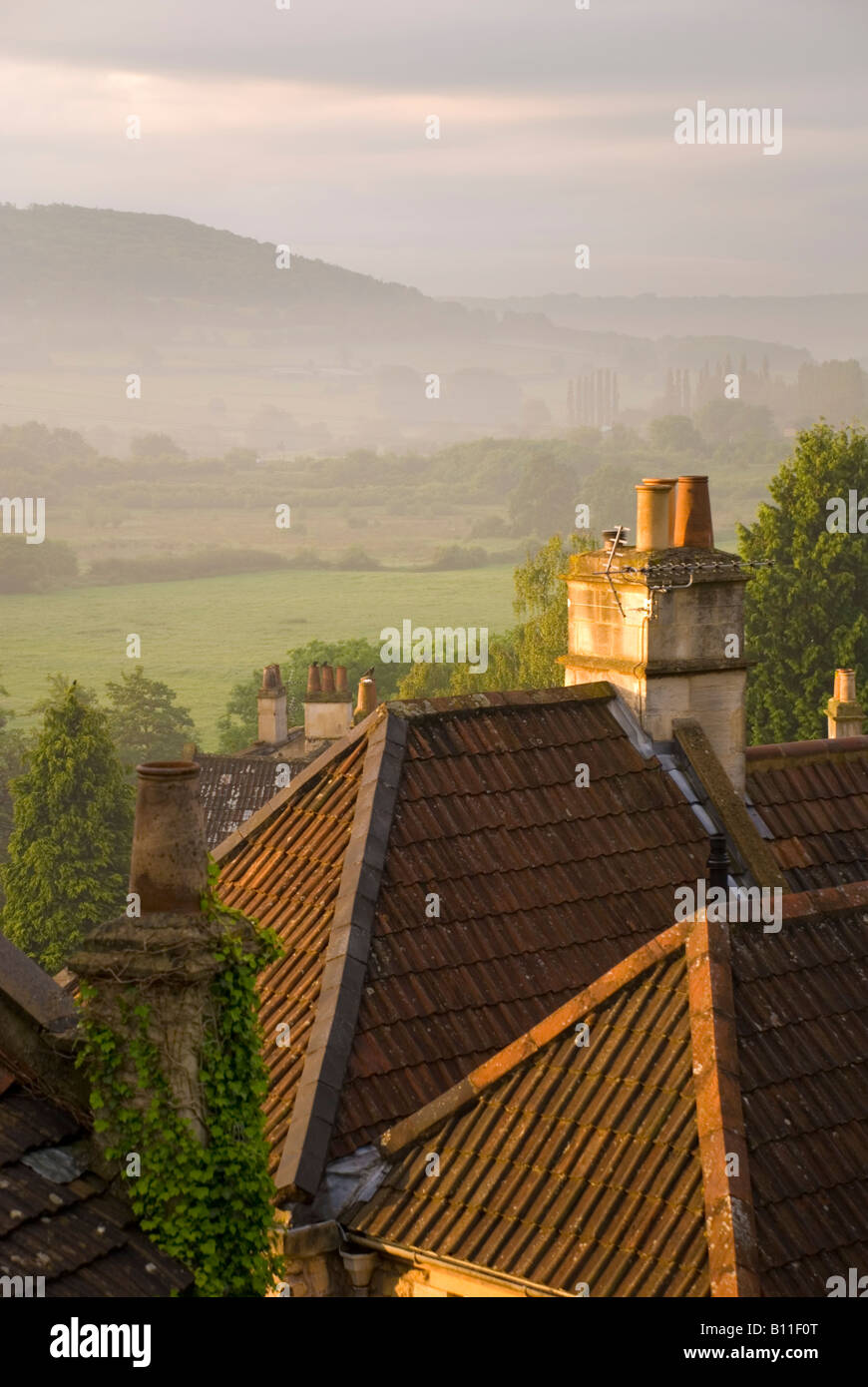 Batheaston Bath BaNES England UK Sunrise over chimney pot and water ...