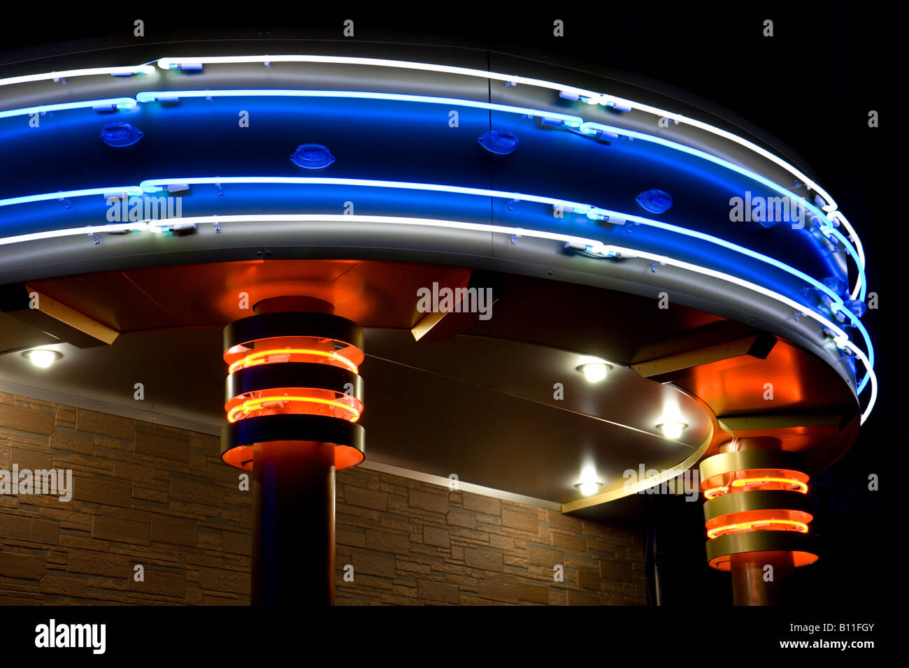 Gate in night bar neon illumination Stock Photo - Alamy