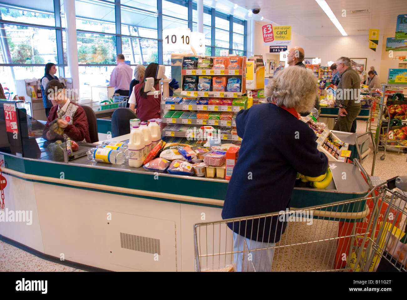 Bath BaNES England UK People queue at a supermarket checkout Stock ...