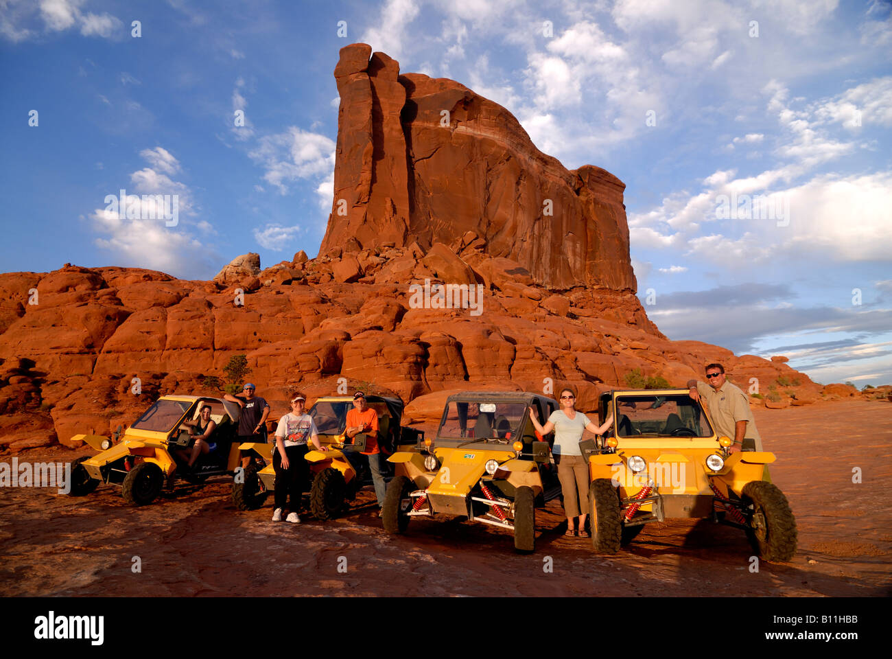 Tourist riding Tomcars little Israelian buggy jeeps Moab Utah USA MR ...