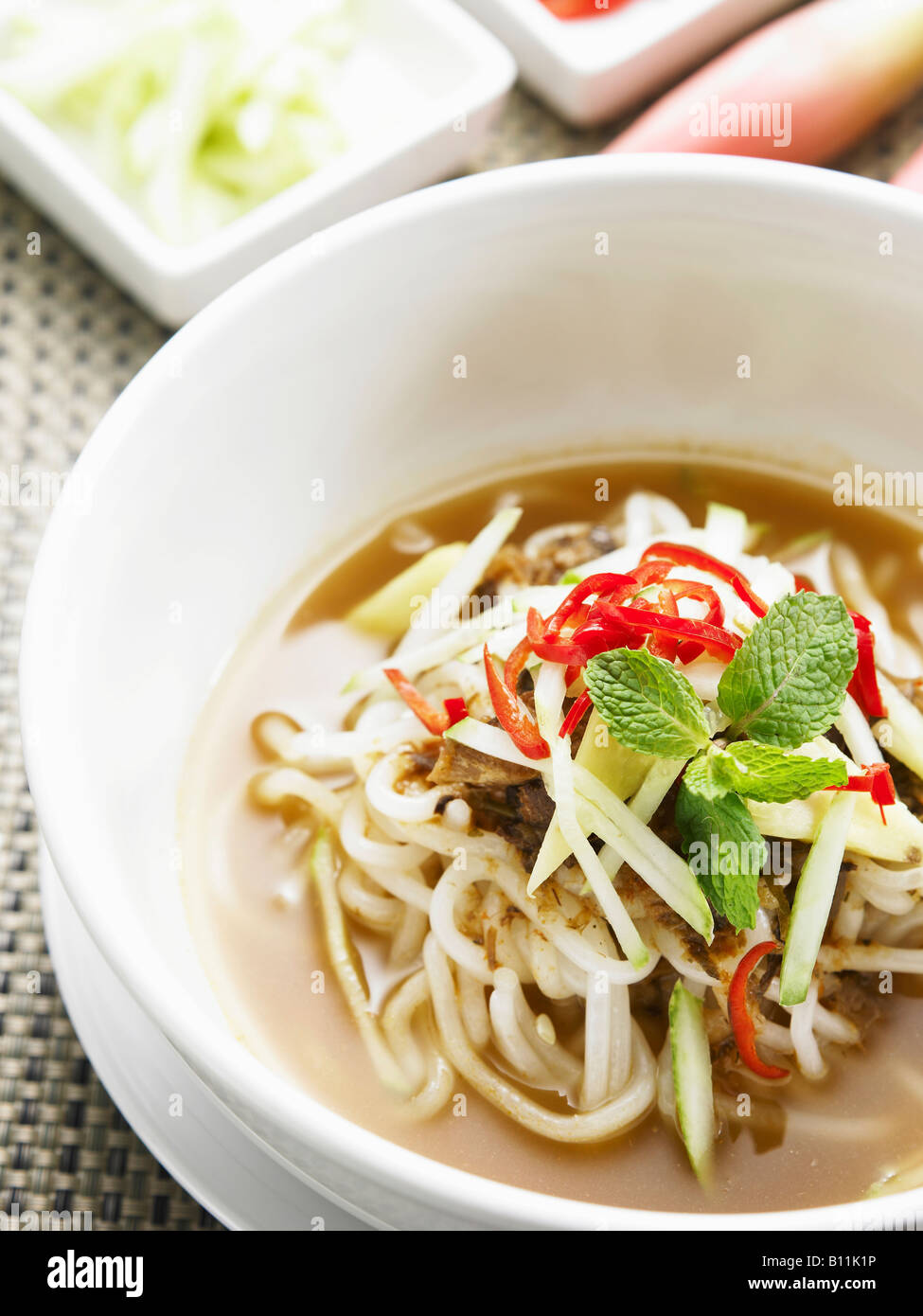 top view of a bowl of assam laksa Stock Photo - Alamy