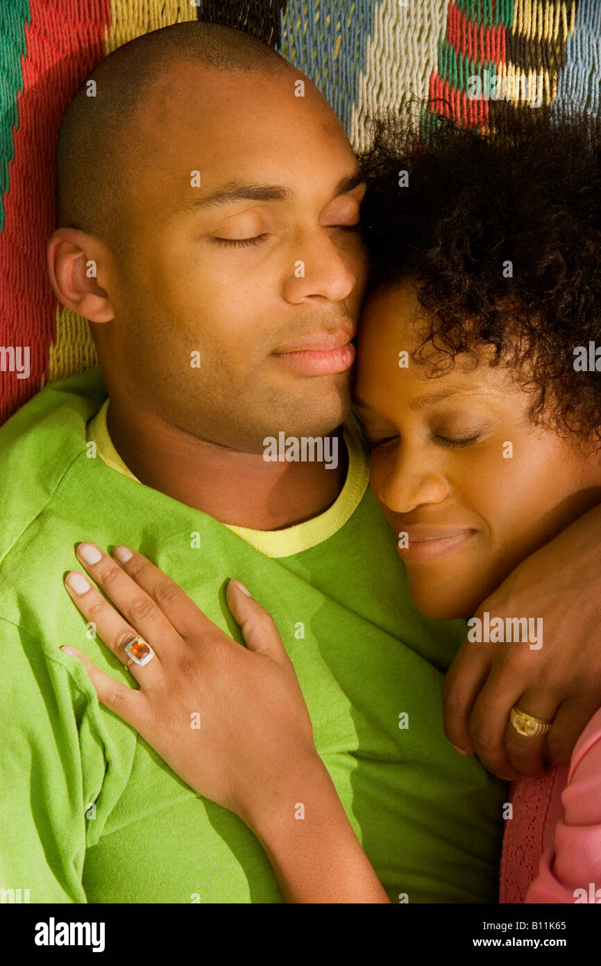 Husband and wife napping together Stock Photo - Alamy