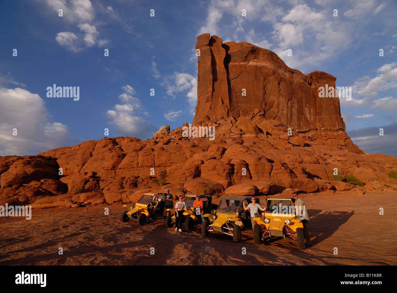 Tourist riding Tomcars little Israelian buggy jeeps Moab Utah USA MR ...