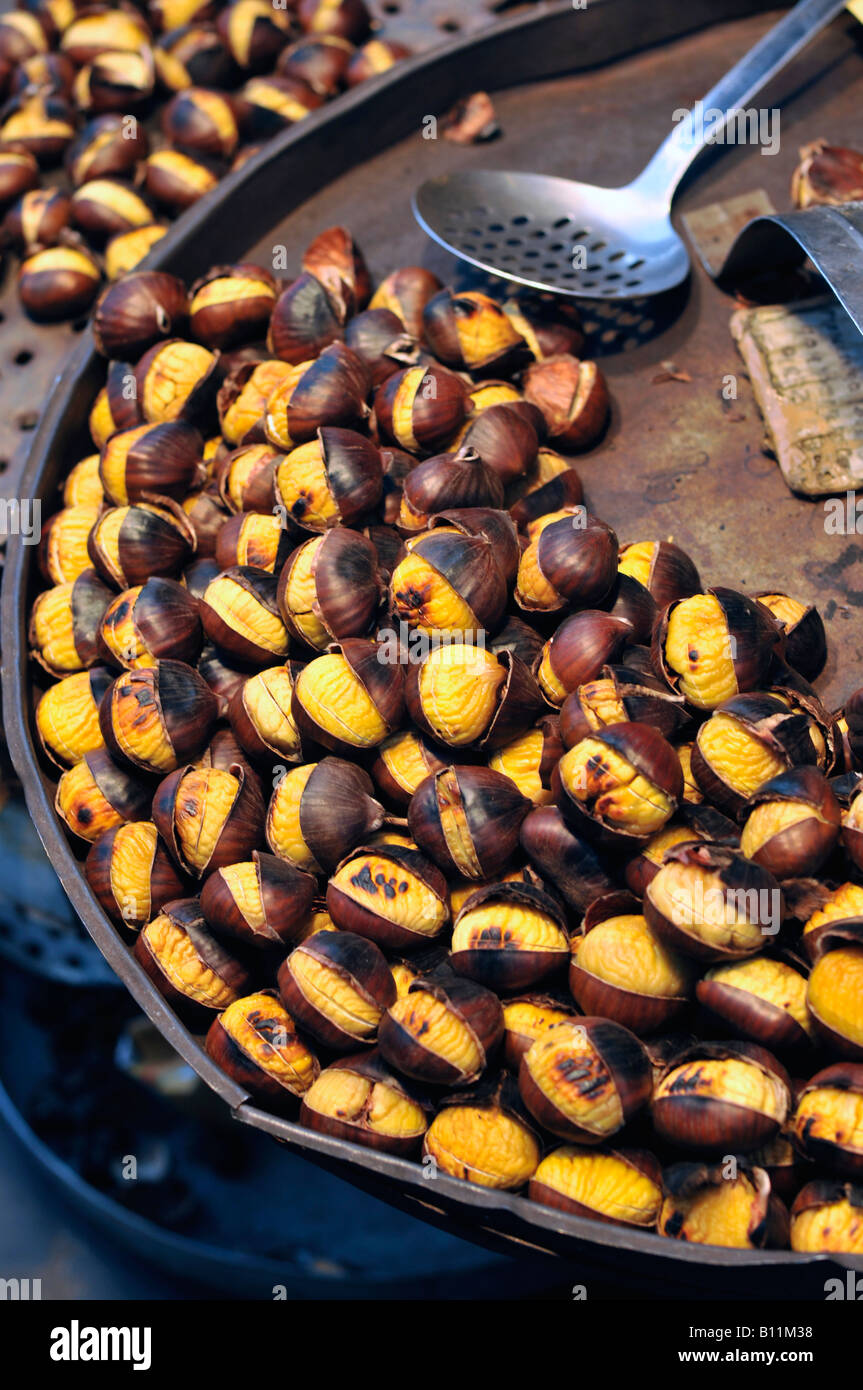 Selling hot roasted chestnuts hi-res stock photography and images - Alamy