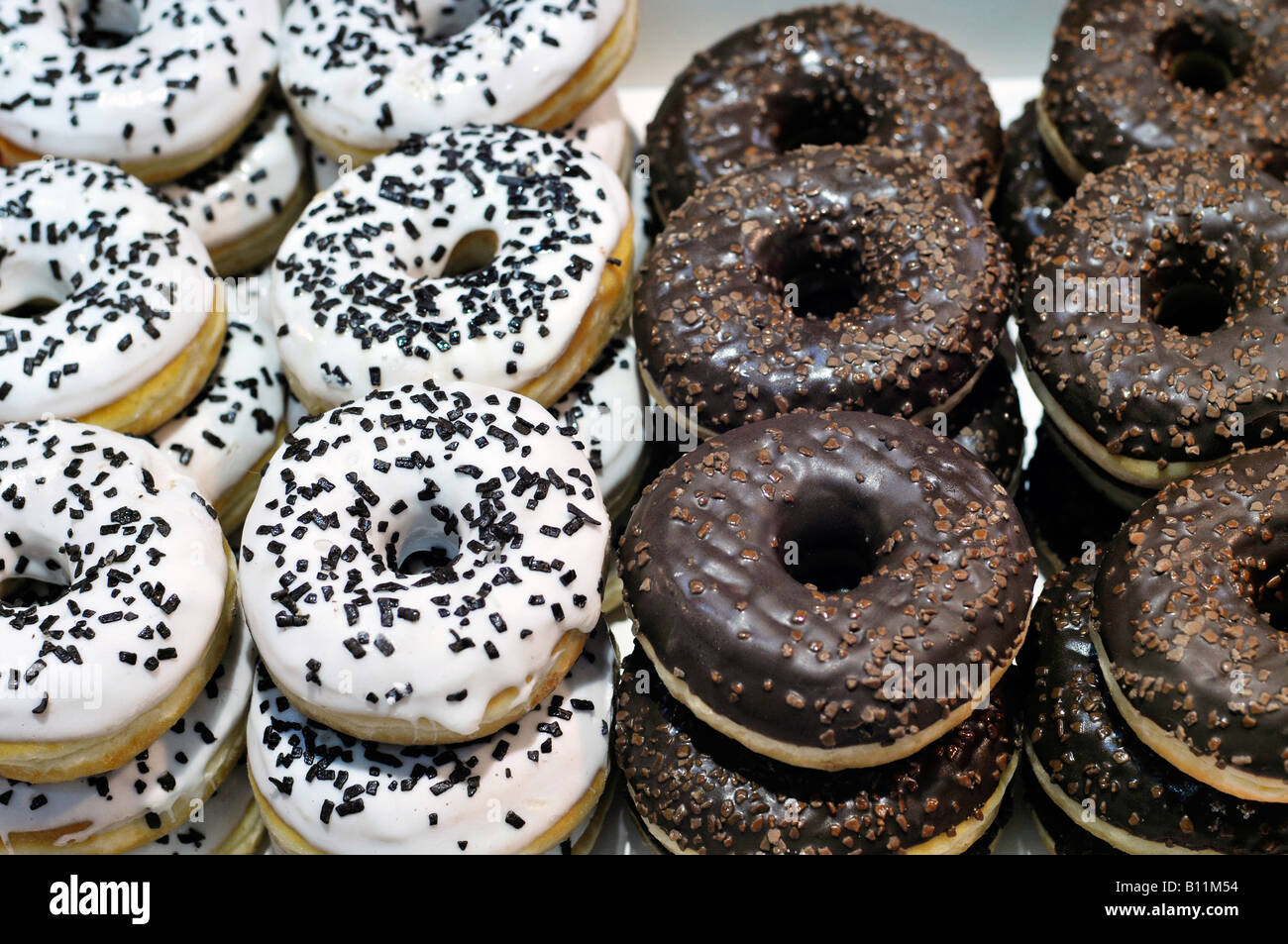 White chocolate donuts doughnuts hi-res stock photography and images ...