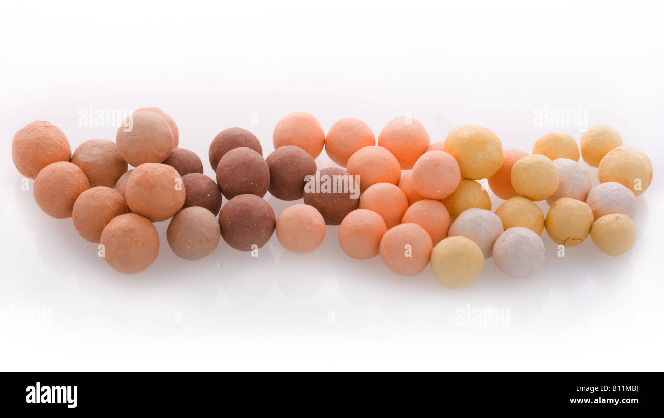 Close up of face powder balls on isolated background Stock Photo - Alamy
