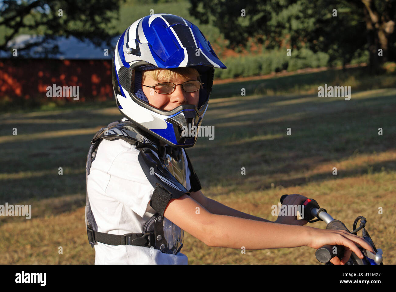 Young boy wearing helmet Stock Photo - Alamy
