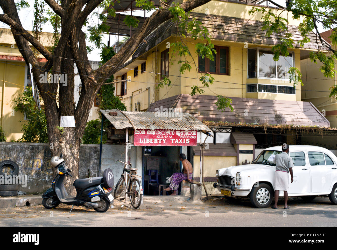 INDIA KOCHI COCHIN Taxi stand in Kochi with a white Ambassador car ...