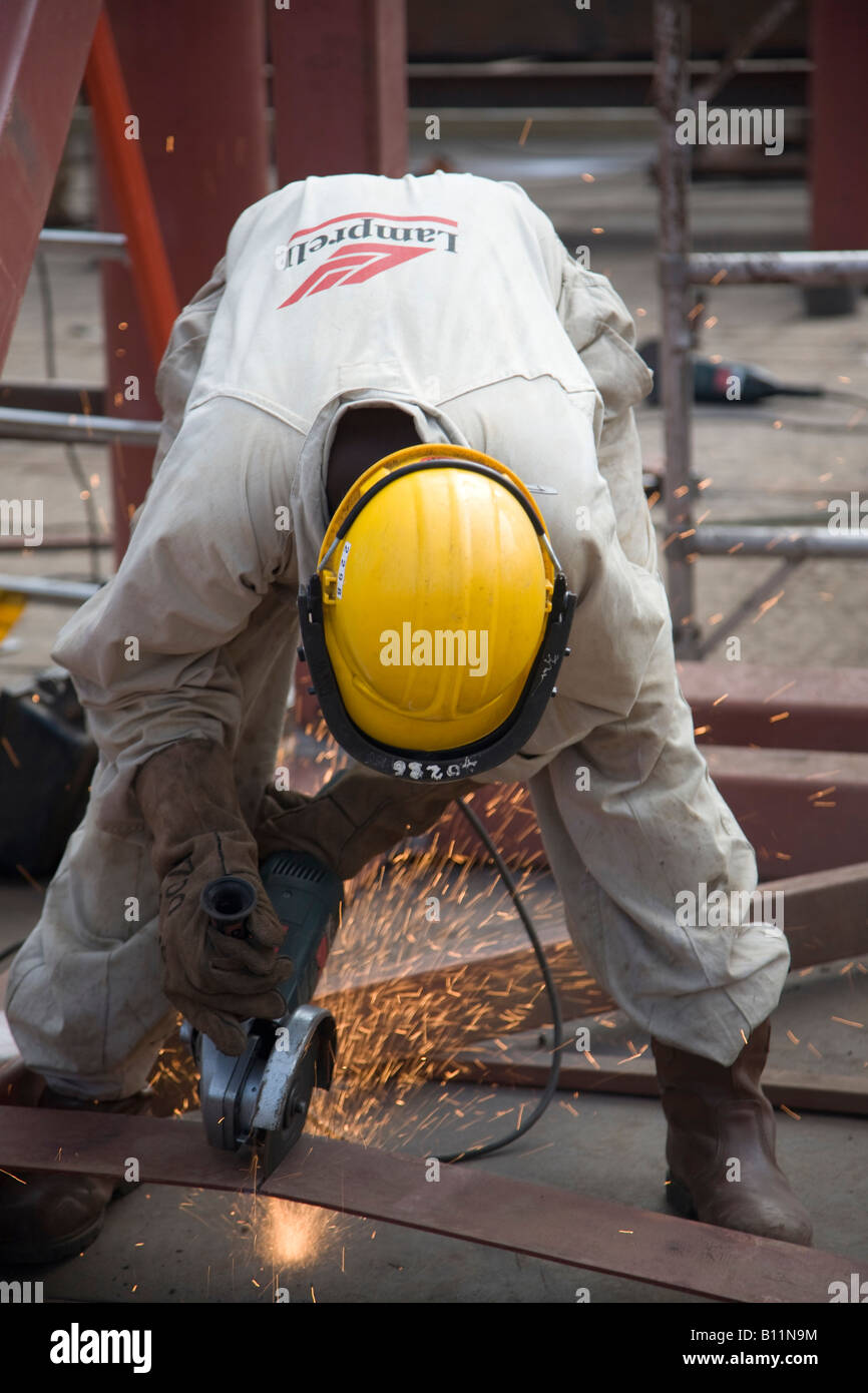 Seaman and worker welders welding on oil rig Stock Photo - Alamy