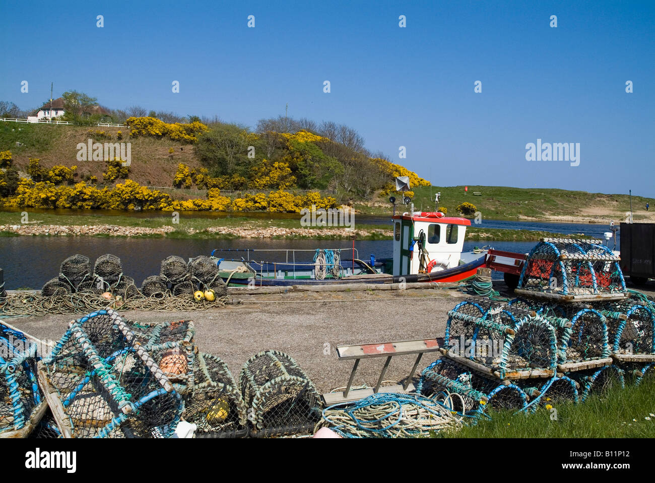 dh Brora Harbour BRORA SUTHERLAND Fishingboats tied up at quayside and ...