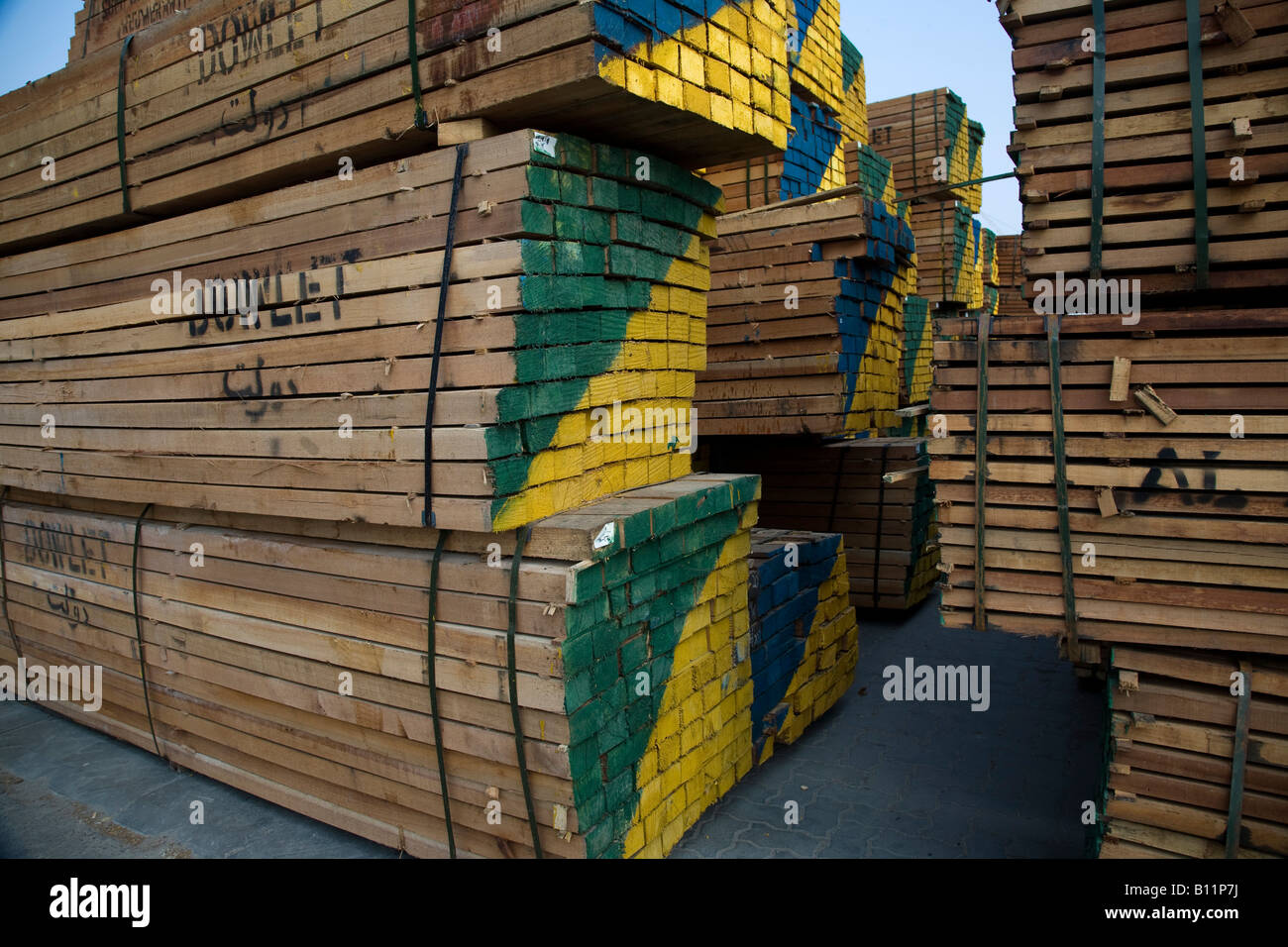 Stacked Timber wood wooden colour color coded planks ready for ...