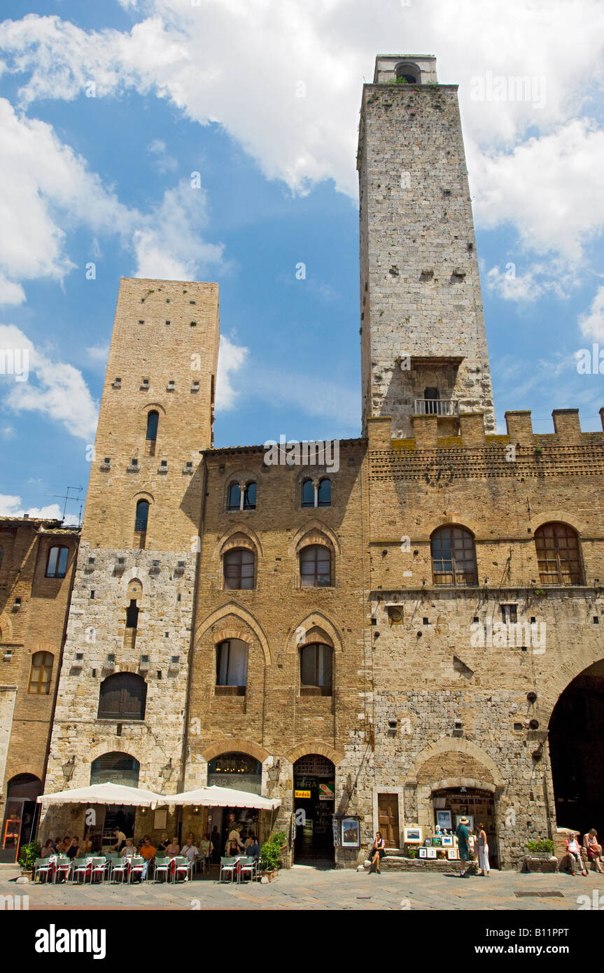 View of two Medieval Towers in Piazza Del Duomo, San Gimignano, Tuscany ...