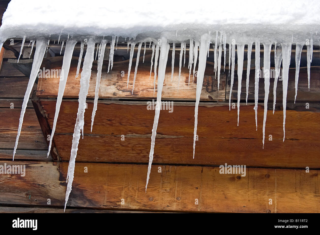 Icicles drip from roof of building in Fairbanks Alaska Stock Photo - Alamy