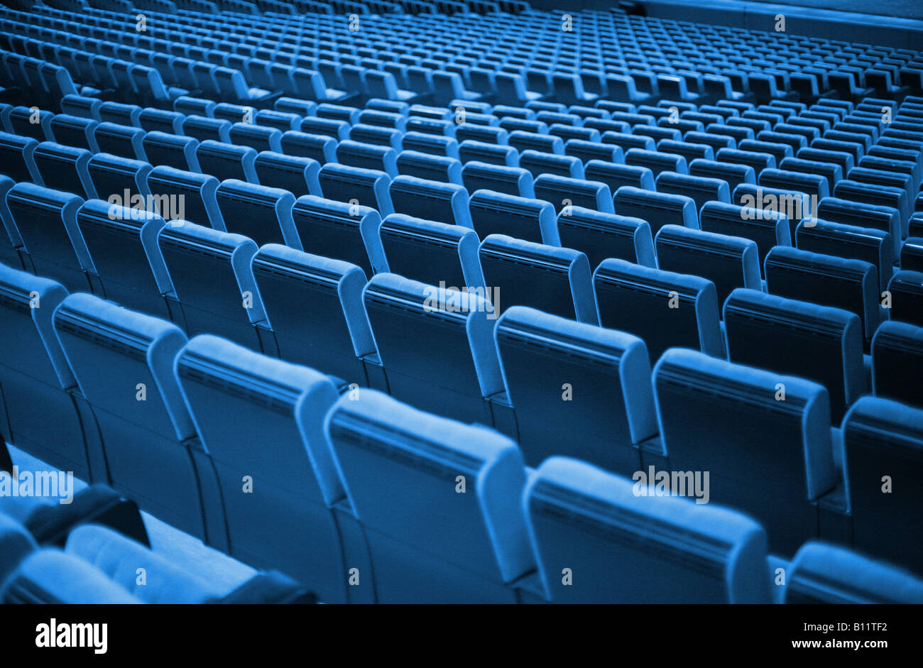 Empty chairs at cinema or theater. Blue tone Stock Photo - Alamy