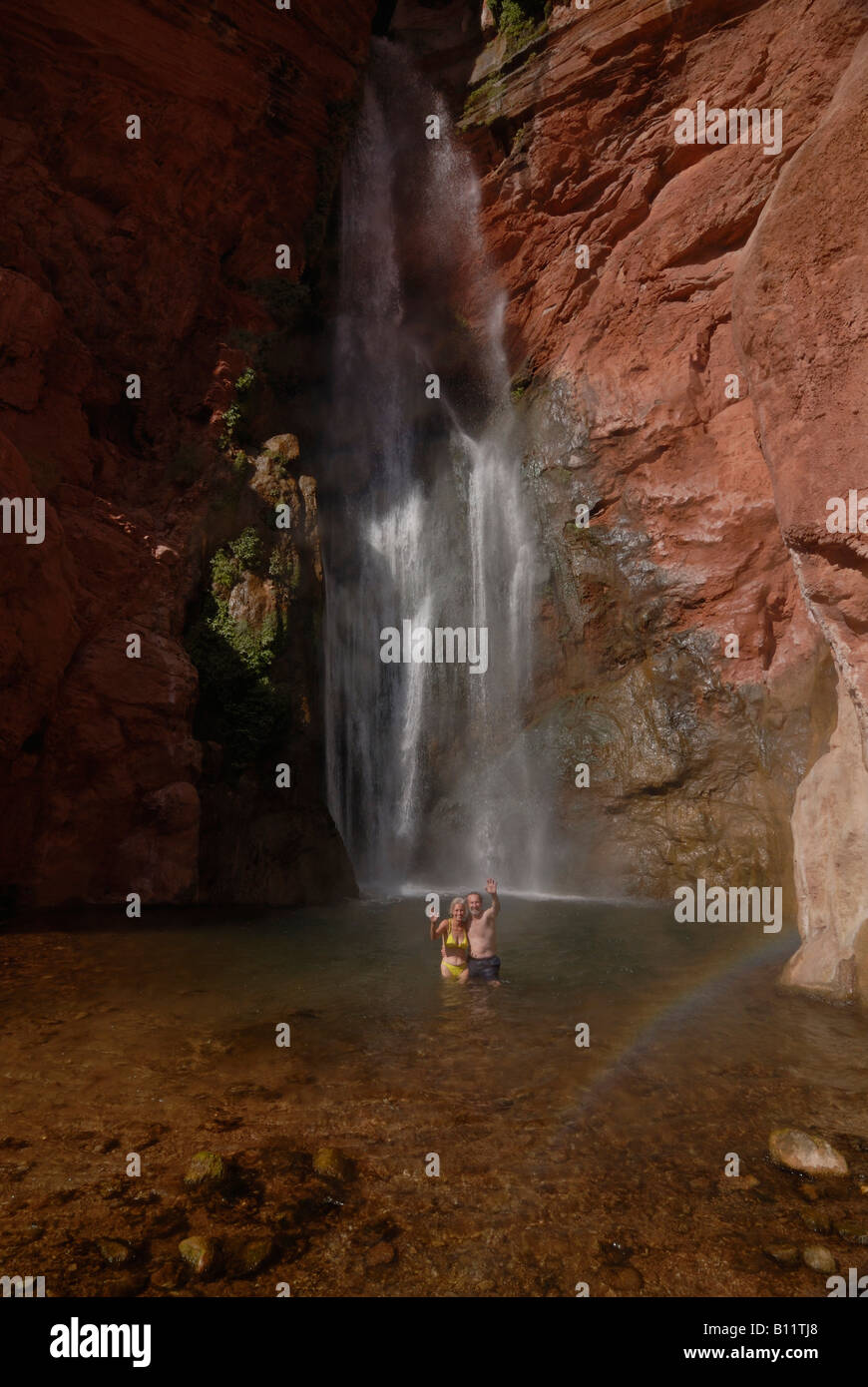 Tourists bathing in a waterfall Grand Canyon Arizona USA MR Stock Photo ...
