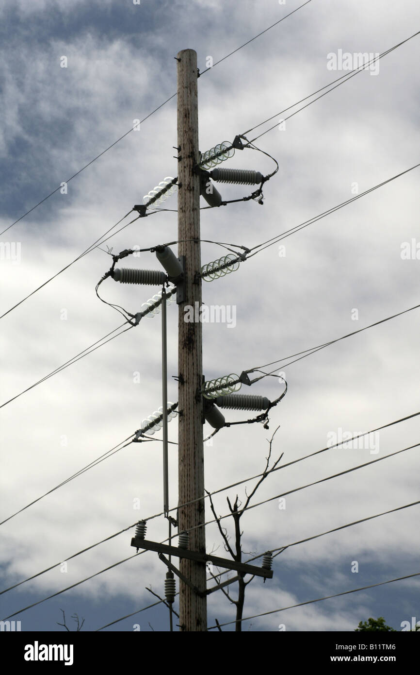 Pole mounted switches on 69kV line, with 12kV distribution lines below ...