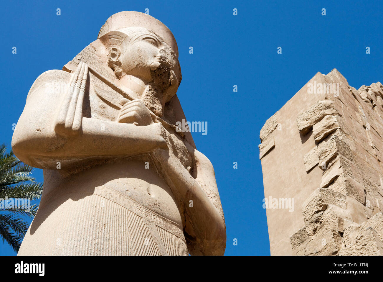 Colossus at the entrance to Precinct of Amun, Temple of Karnak, Luxor ...