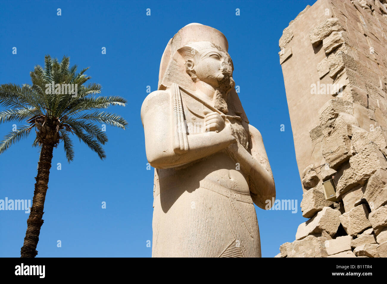 Colossus at the entrance to Precinct of Amun, Temple of Karnak, Luxor ...