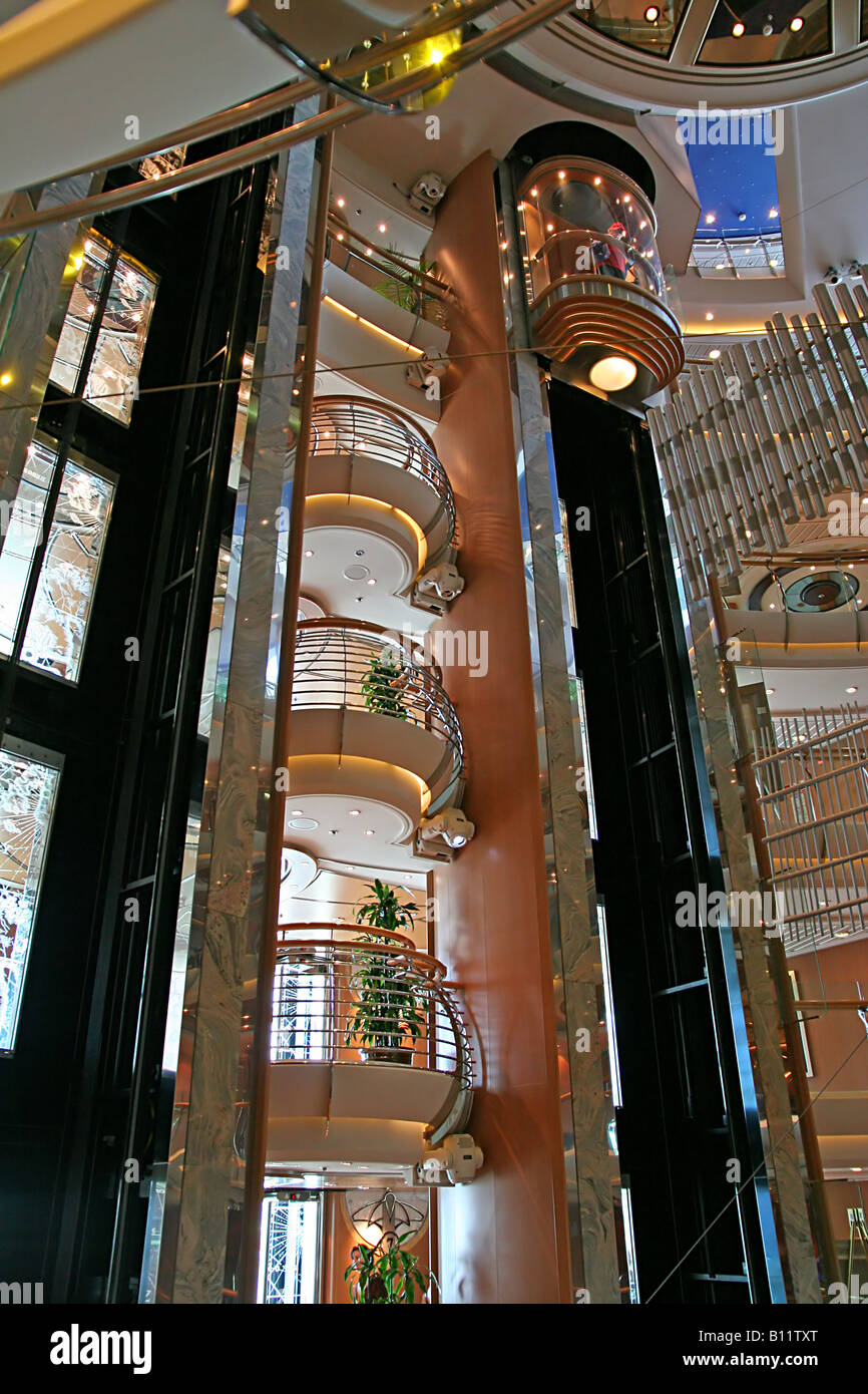 A Modern Atrium Lobby With Glass Elevators Stock Photo Alamy