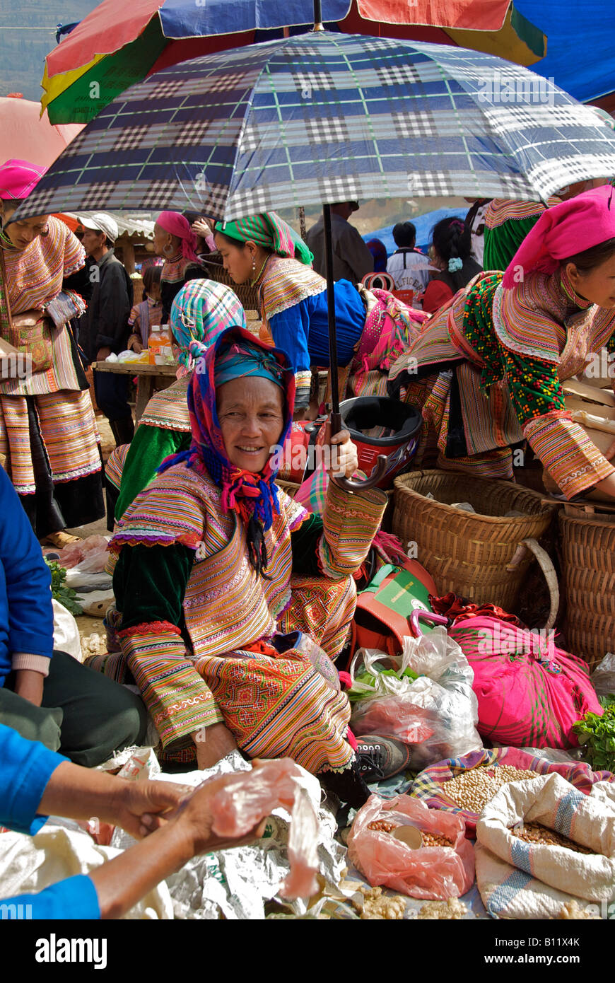 Flower Hmong woman with umbrella Bac Ha Sunday Market Northern Vietnam ...