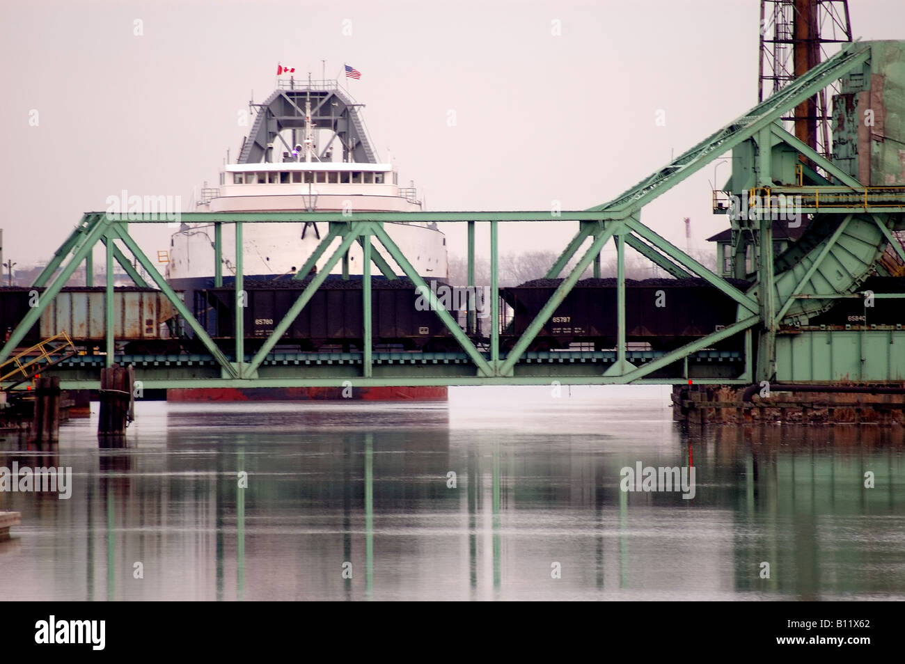 Coal Ship at Railroad Bridge Stock Photo - Alamy