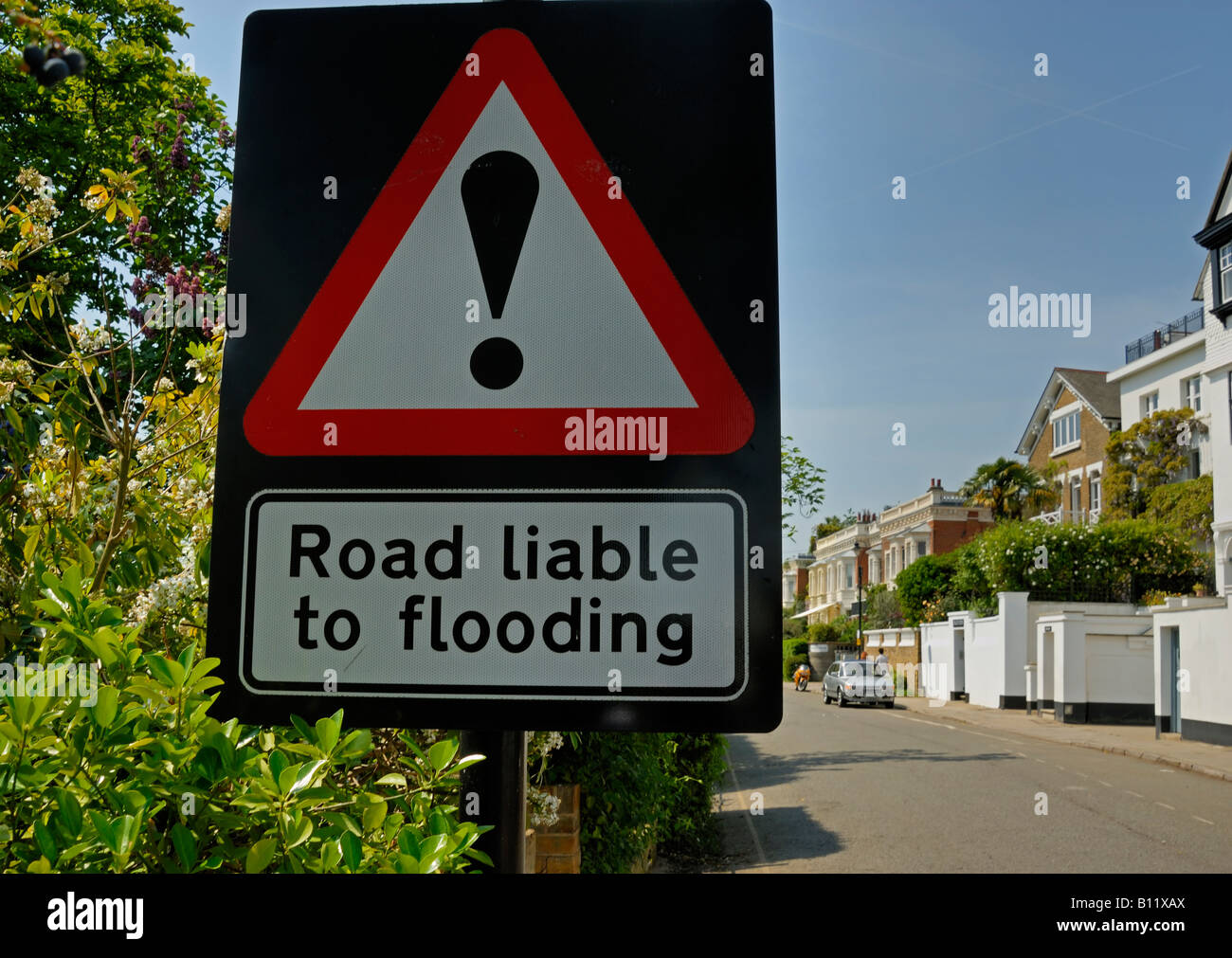 Warning sign: risk of flooding, Chiswick, London Stock Photo - Alamy